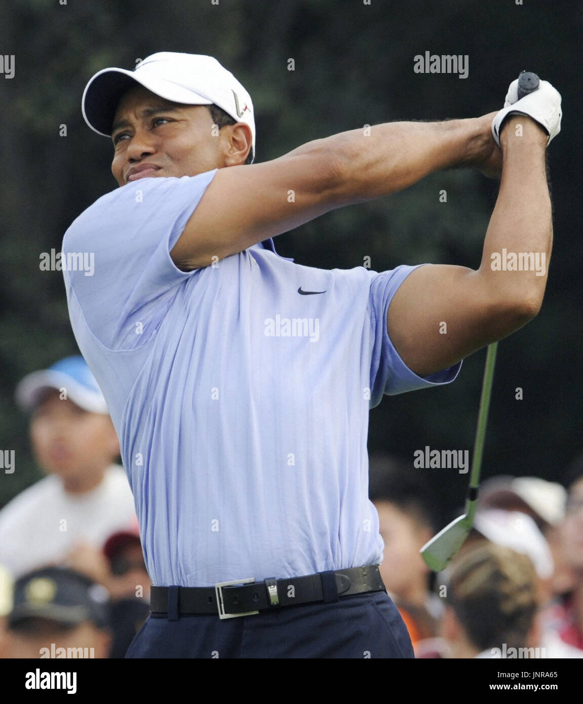 SHANGHAI, China - World No. 1 Tiger Woods swings at the prestigious ...