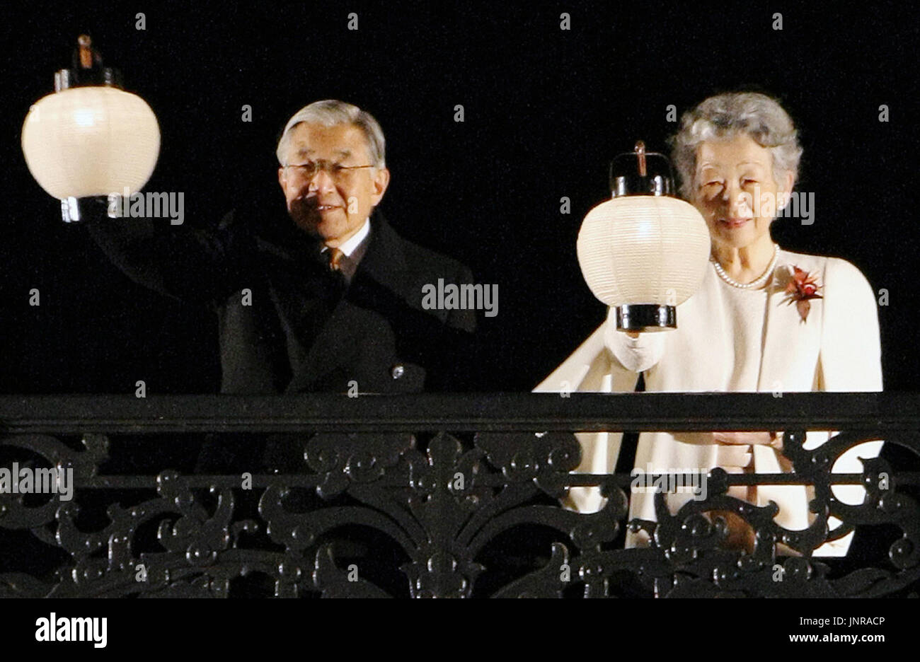 TOKYO, Japan - Emperor Akihito and Empress Michiko hold paper lanterns ...
