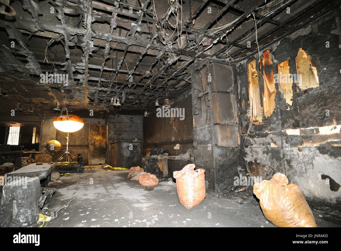 BUSAN, South Korea - This photo shows the site of a fatal fire that ...