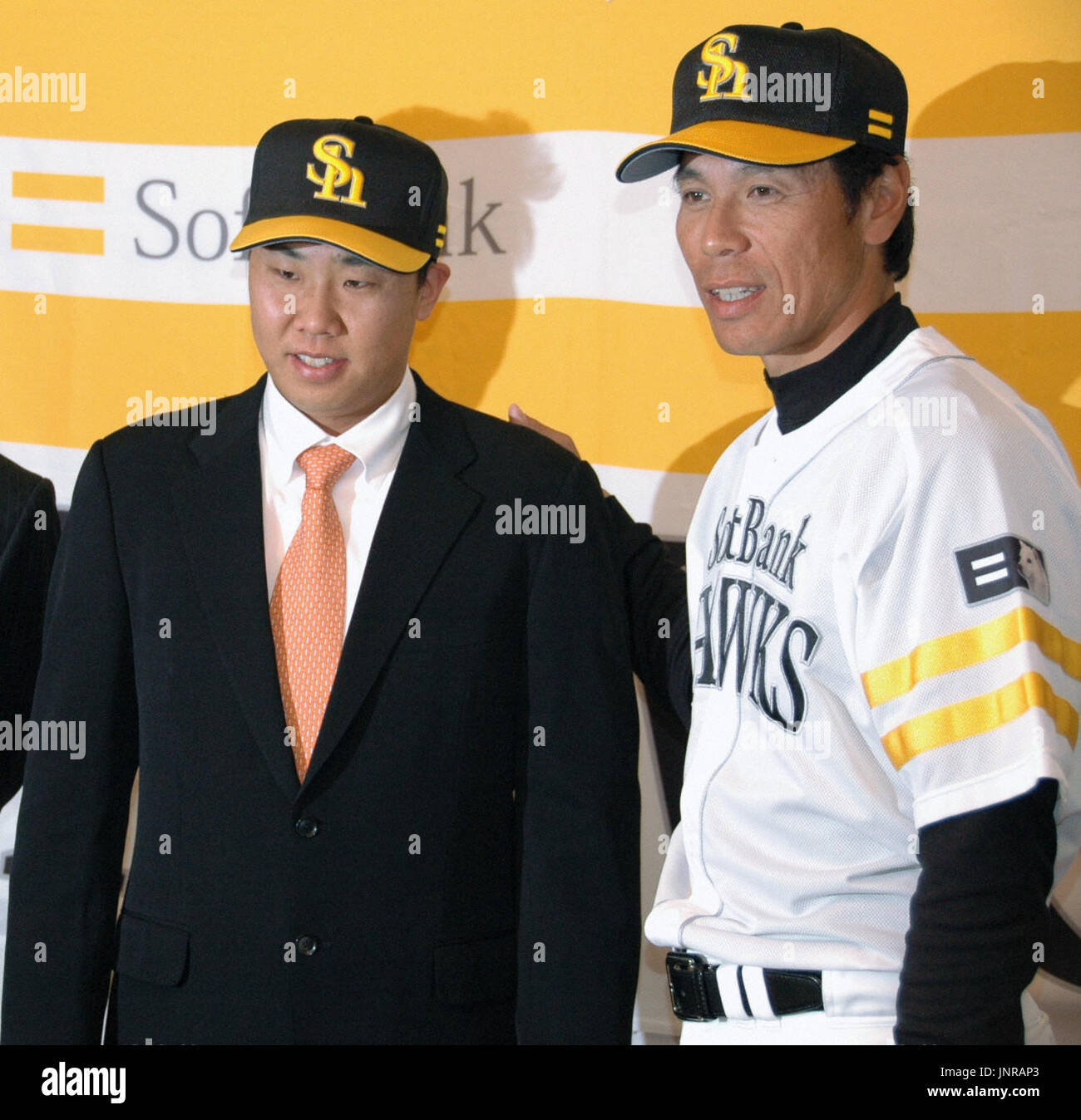 MIYAZAKI, Japan - South Korean third baseman Lee Bum Ho (L) poses for ...
