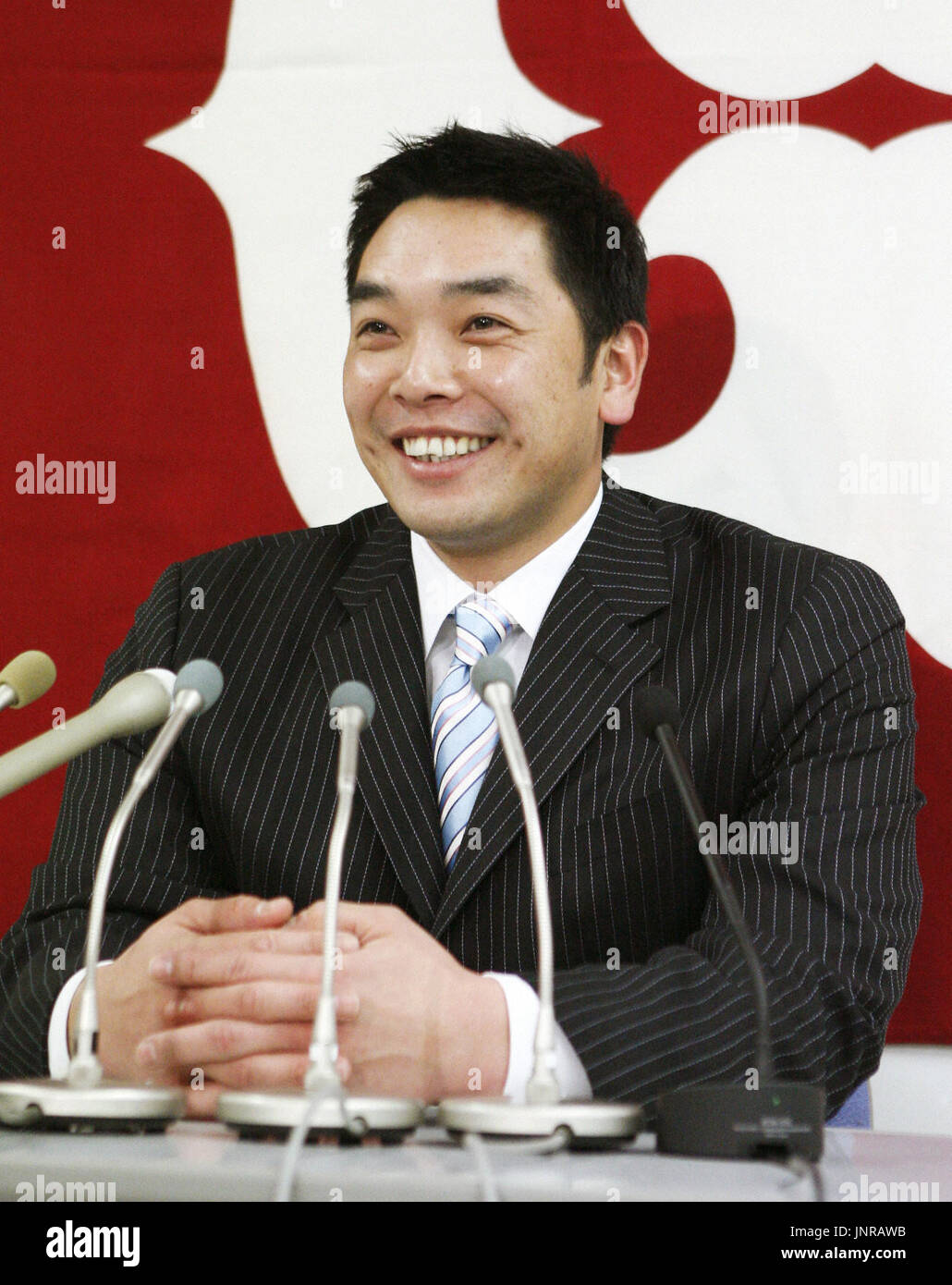 TOKYO, Japan - Japan Series MVP catcher Shinnosuke Abe smiles during a ...