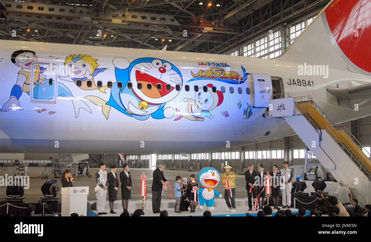 TOKYO, Japan - Japan Airlines Corp. officials unveil an aircraft ...