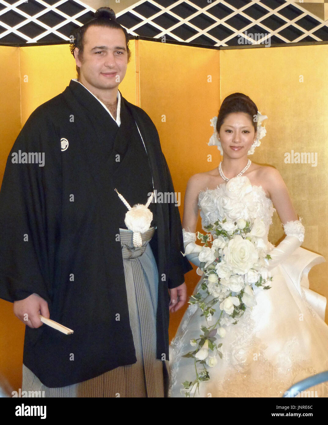 TOKYO, Japan - Bulgarian ozeki Kotooshu and his wife Asako pose during ...
