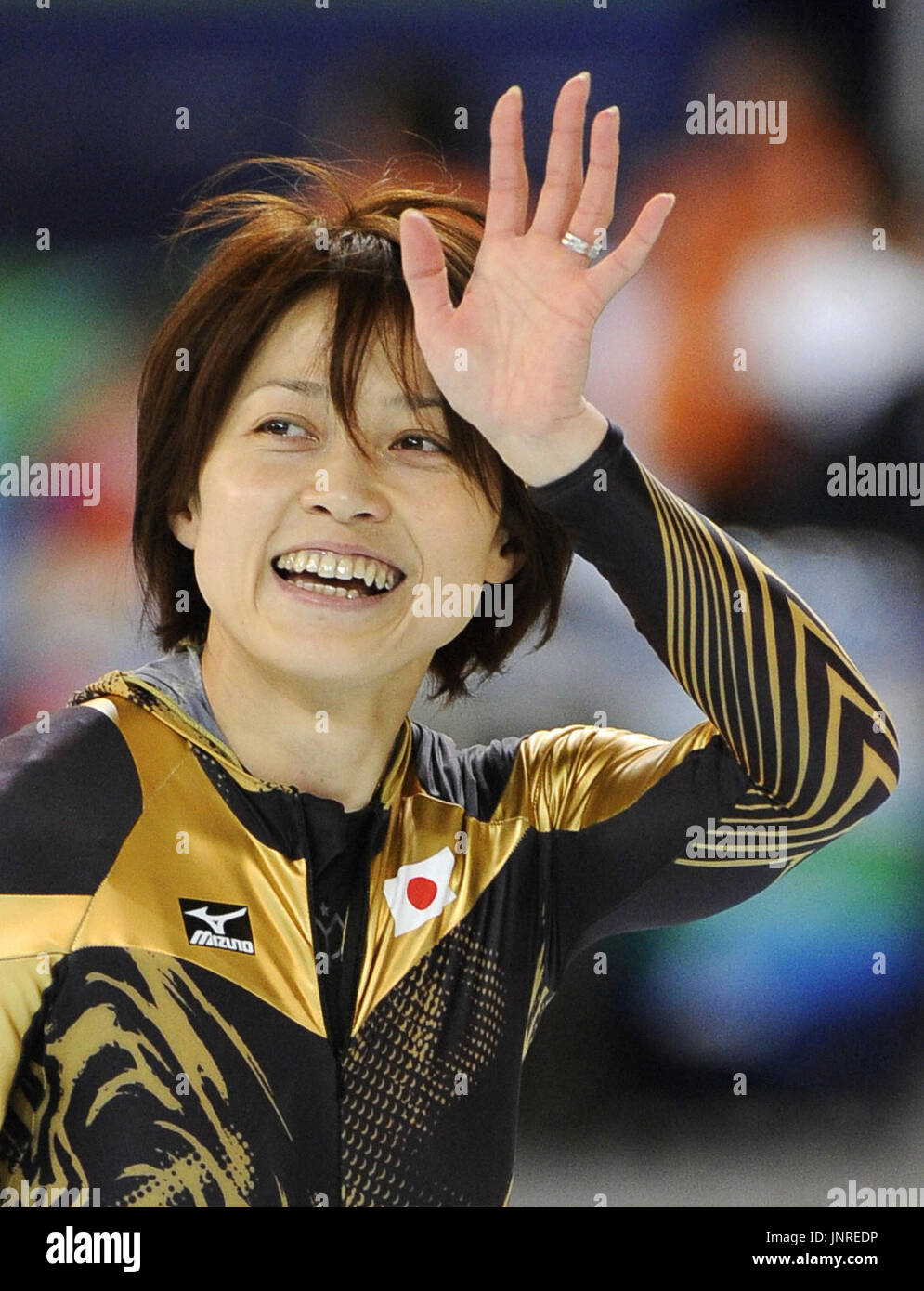 RICHMOND, Canada - Japan's Tomomi Okazaki waves to the crowd after ...