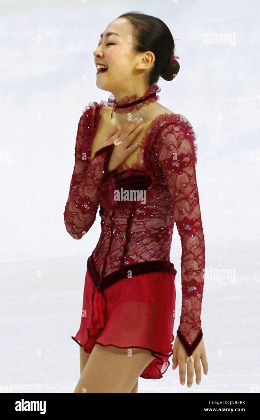VANCOUVER, Canada - Japan's Mao Asada catches her breath after a ...