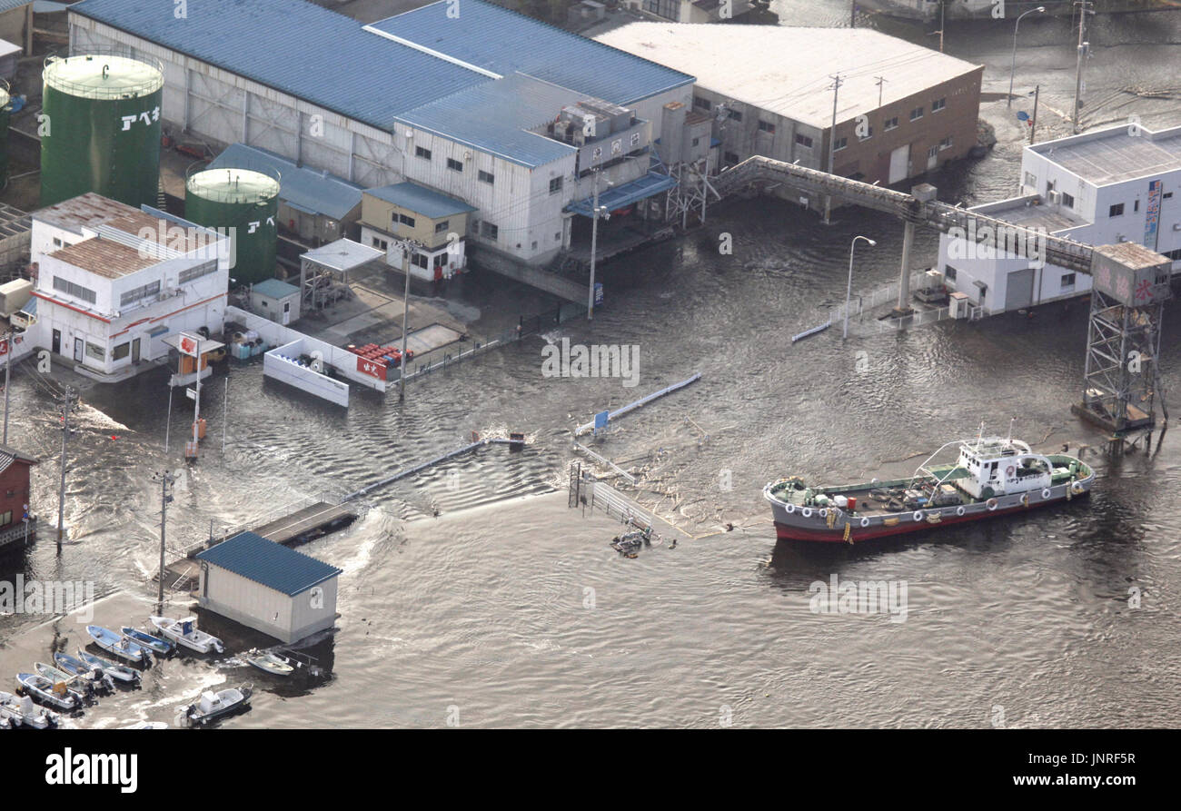 KESENNUMA, Japan - Seawater is seen flowing into an urban area in the ...