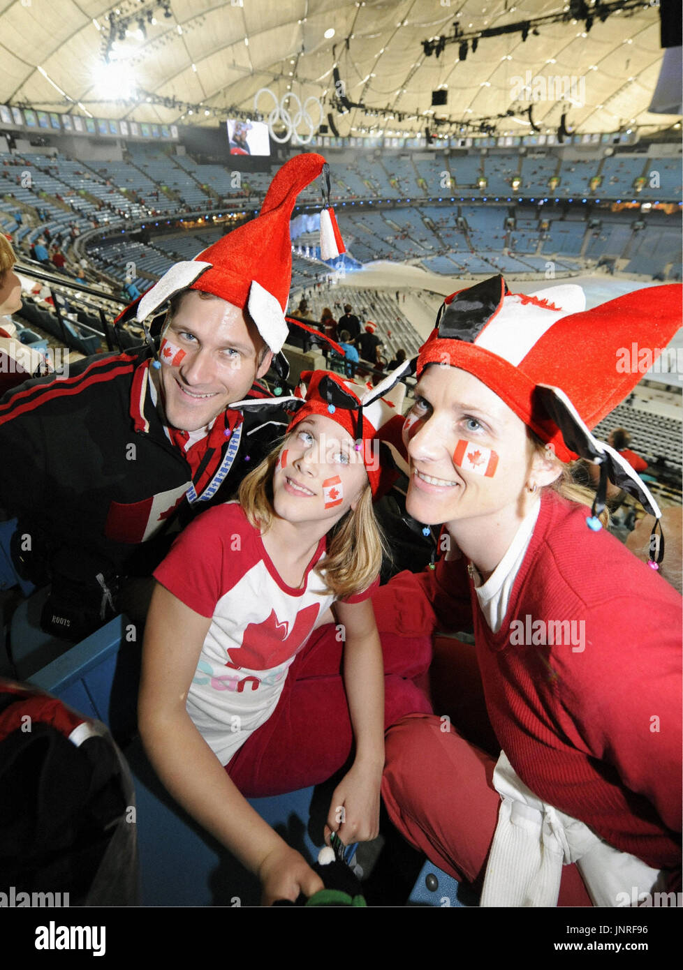VANCOUVER, Canada - A Canadian family clown around while waiting for ...