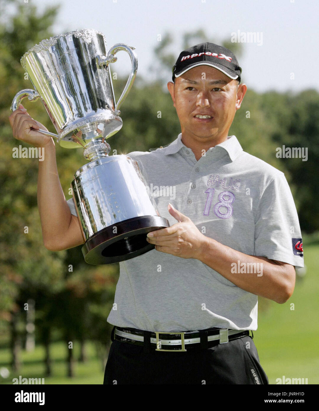 SAPPORO, Japan - Toru Taniguchi poses with the winner's trophy after ...