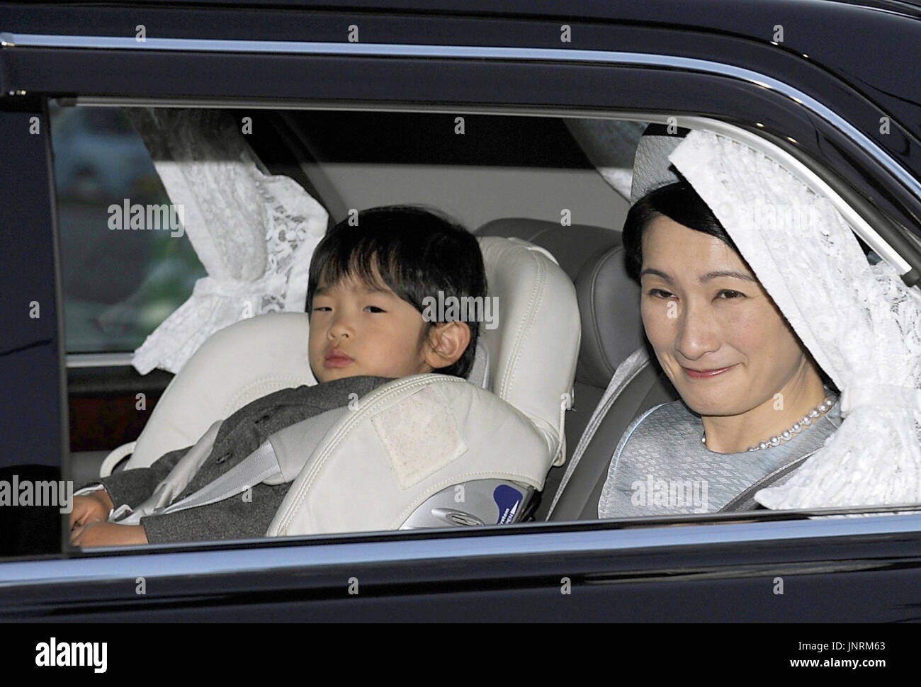 TOKYO, Japan - Princess Kiko (R) and her son Prince Hisahito arrive at ...