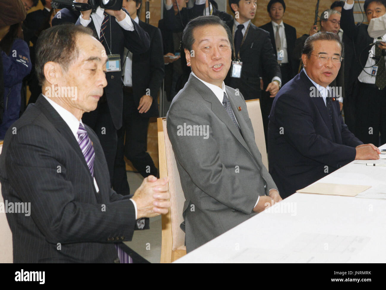 TOKYO, Japan - (From L) Azuma Koshiishi, acting secretary general of ...
