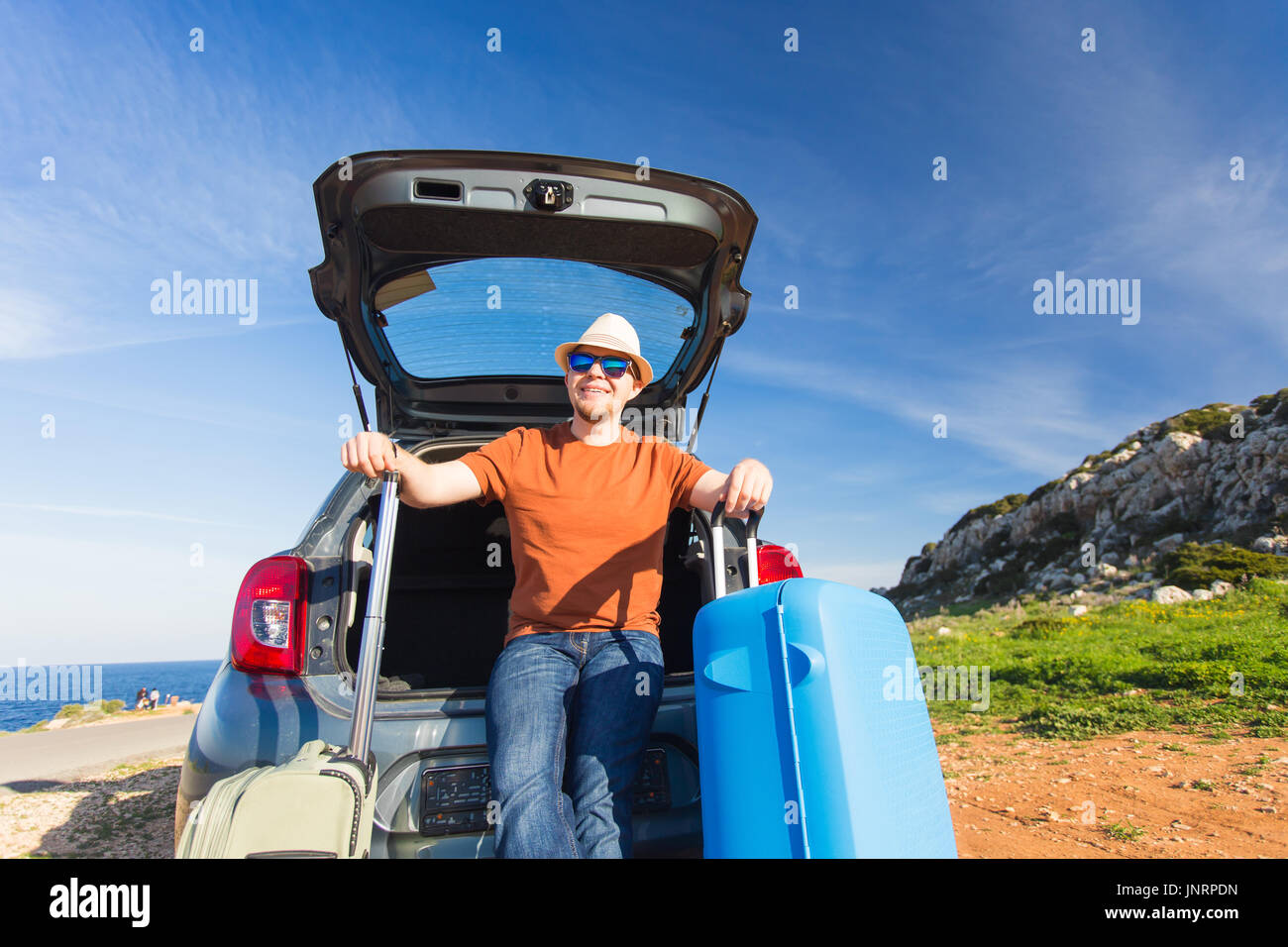 happy man enjoying road trip and summer vacation. Travel, holidays and ...