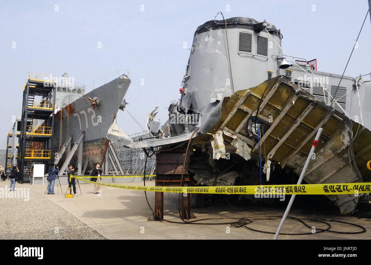 SEOUL, South Korea - Reporters, photographers and TV crews view the ...