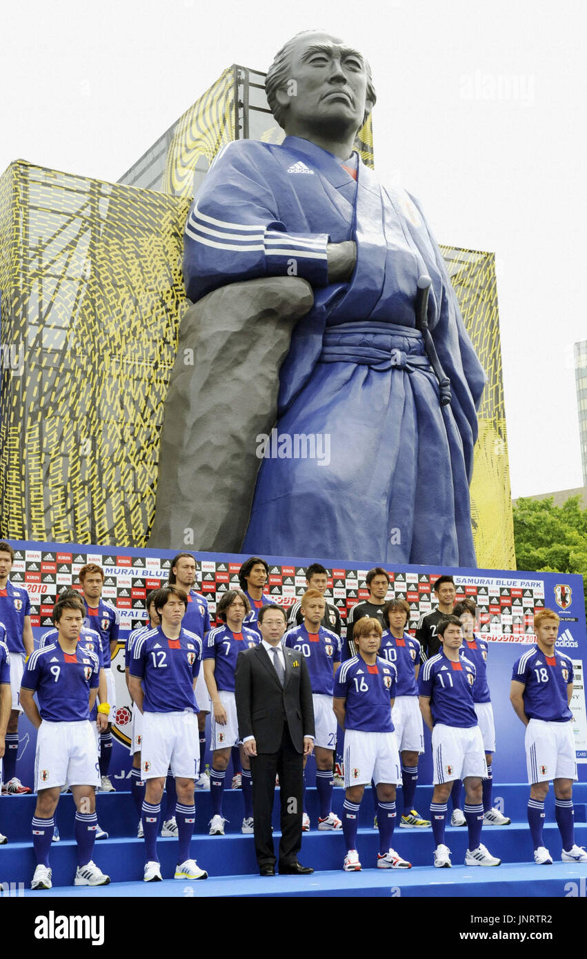 TOKYO, Japan - Coach Takeshi Okada and the 23-member squad of the ...