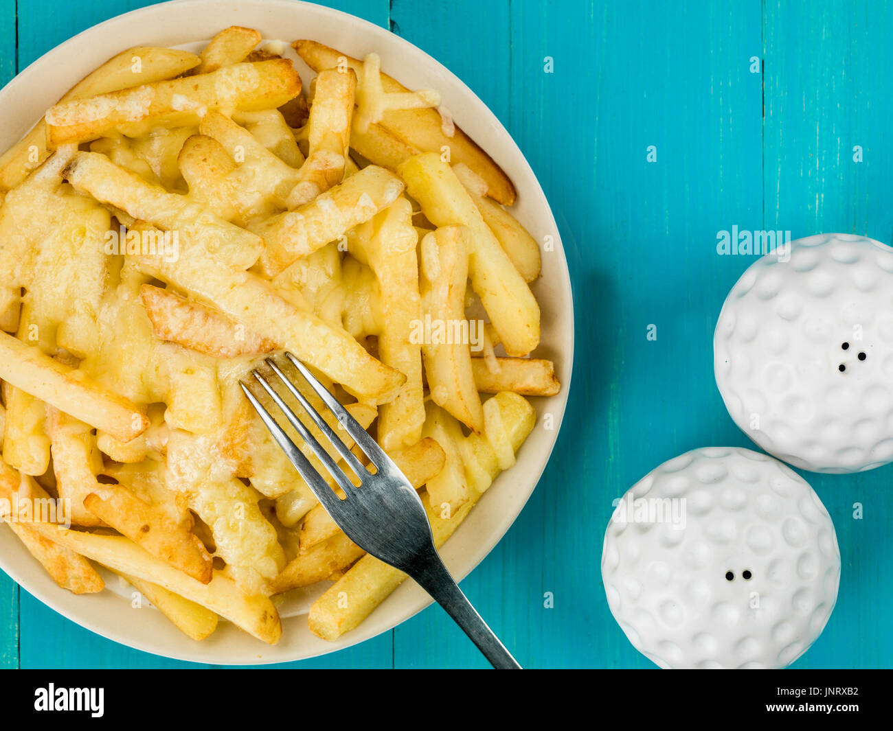 Cheesy fried chips hi-res stock photography and images - Alamy