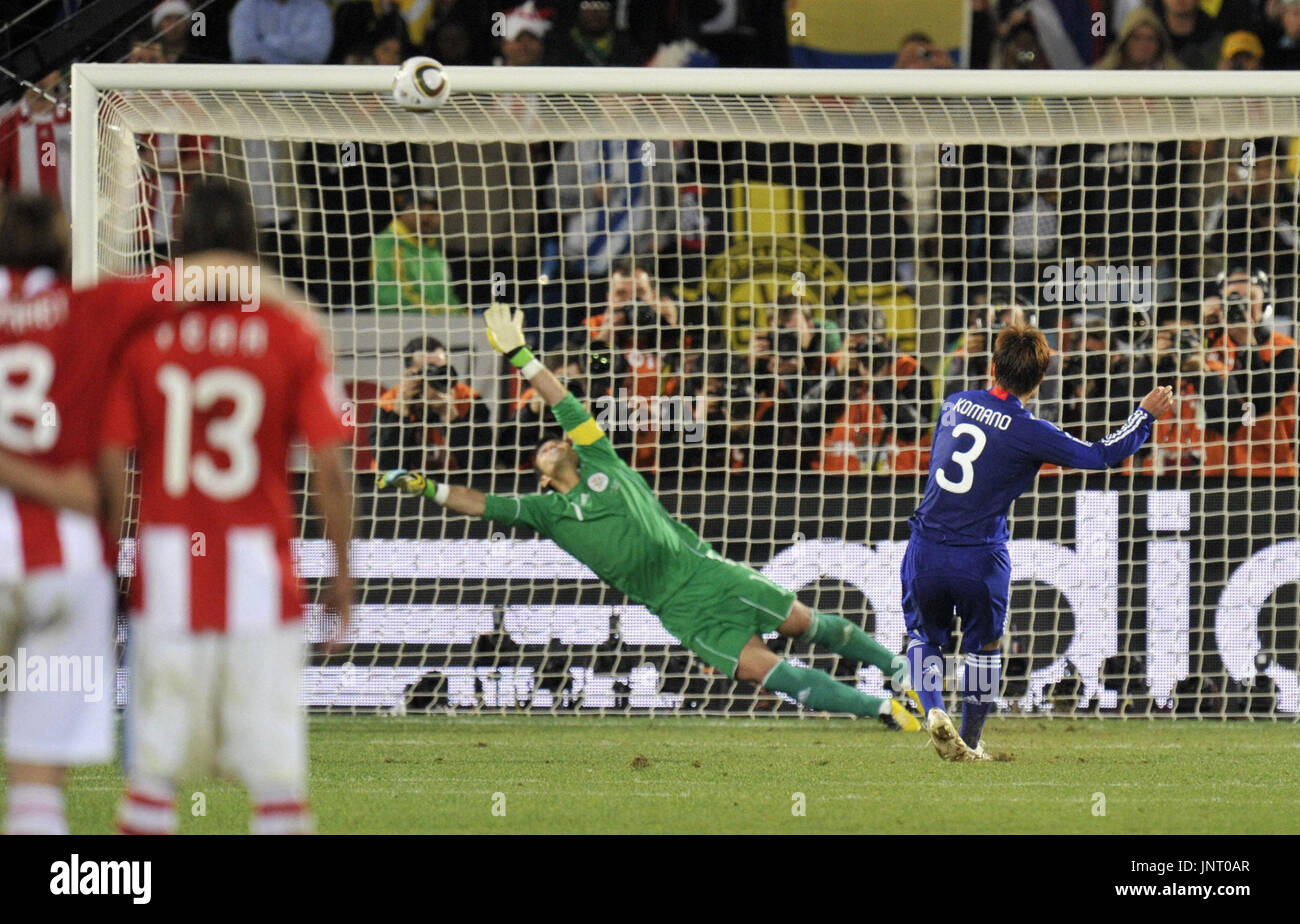 PRETORIA, South Africa - Japan defender Yuichi Komano hits the crossbar ...