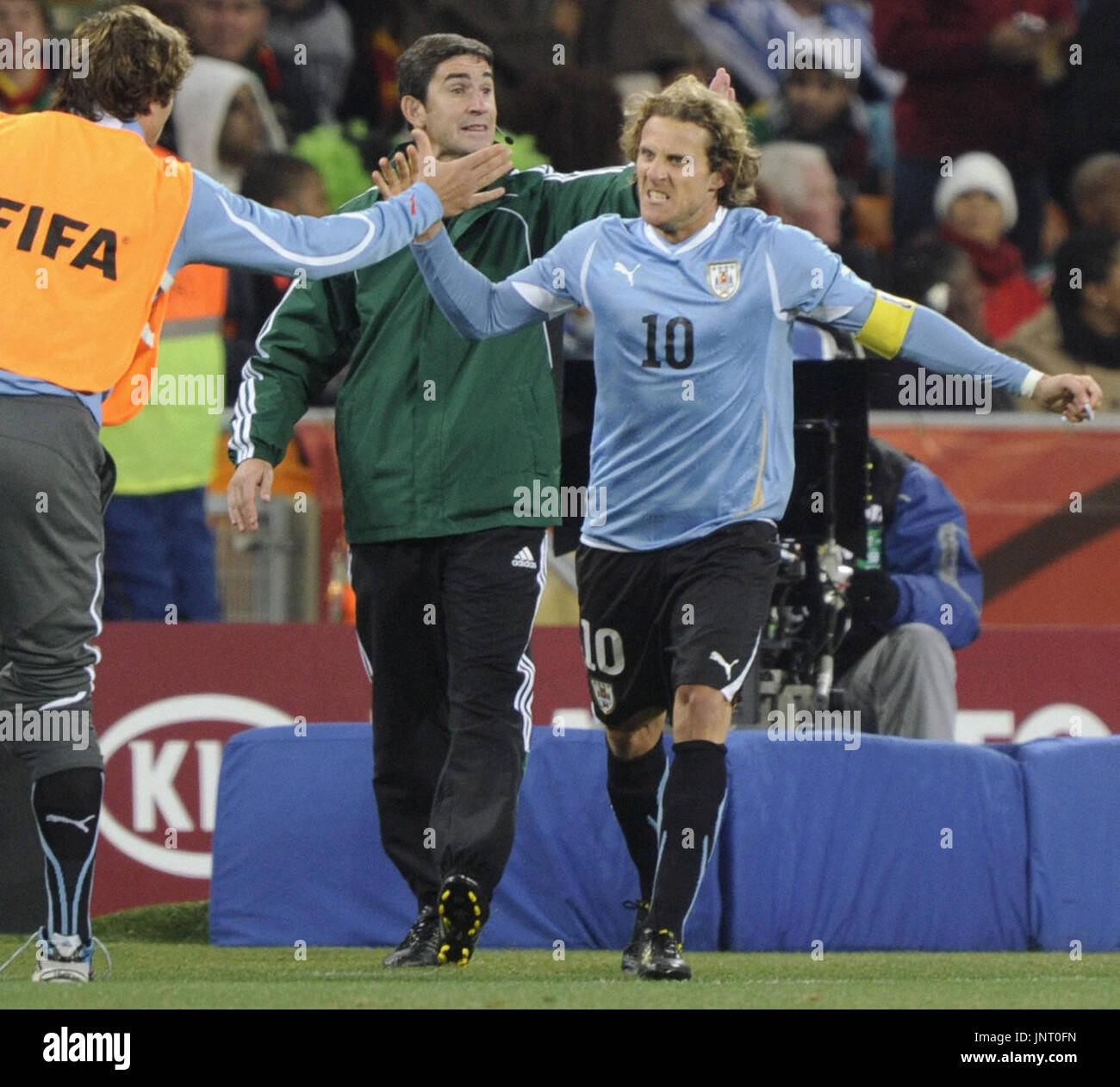 JOHANNESBURG, South Africa - Uruguay striker Diego Forlan (R ...
