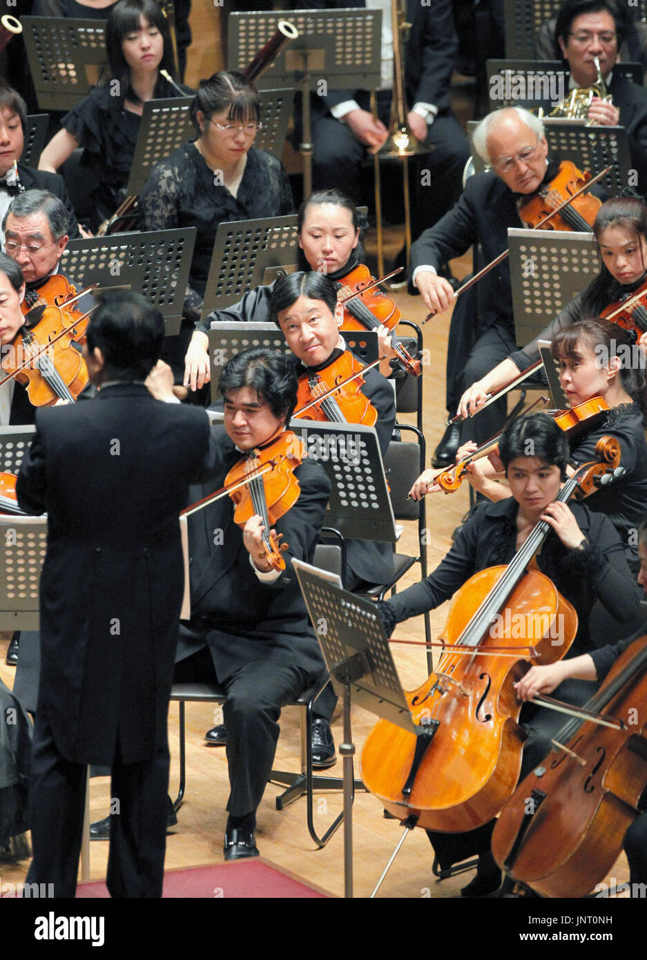 TOKYO, Japan - Crown Prince Naruhito (C) plays the viola during a ...