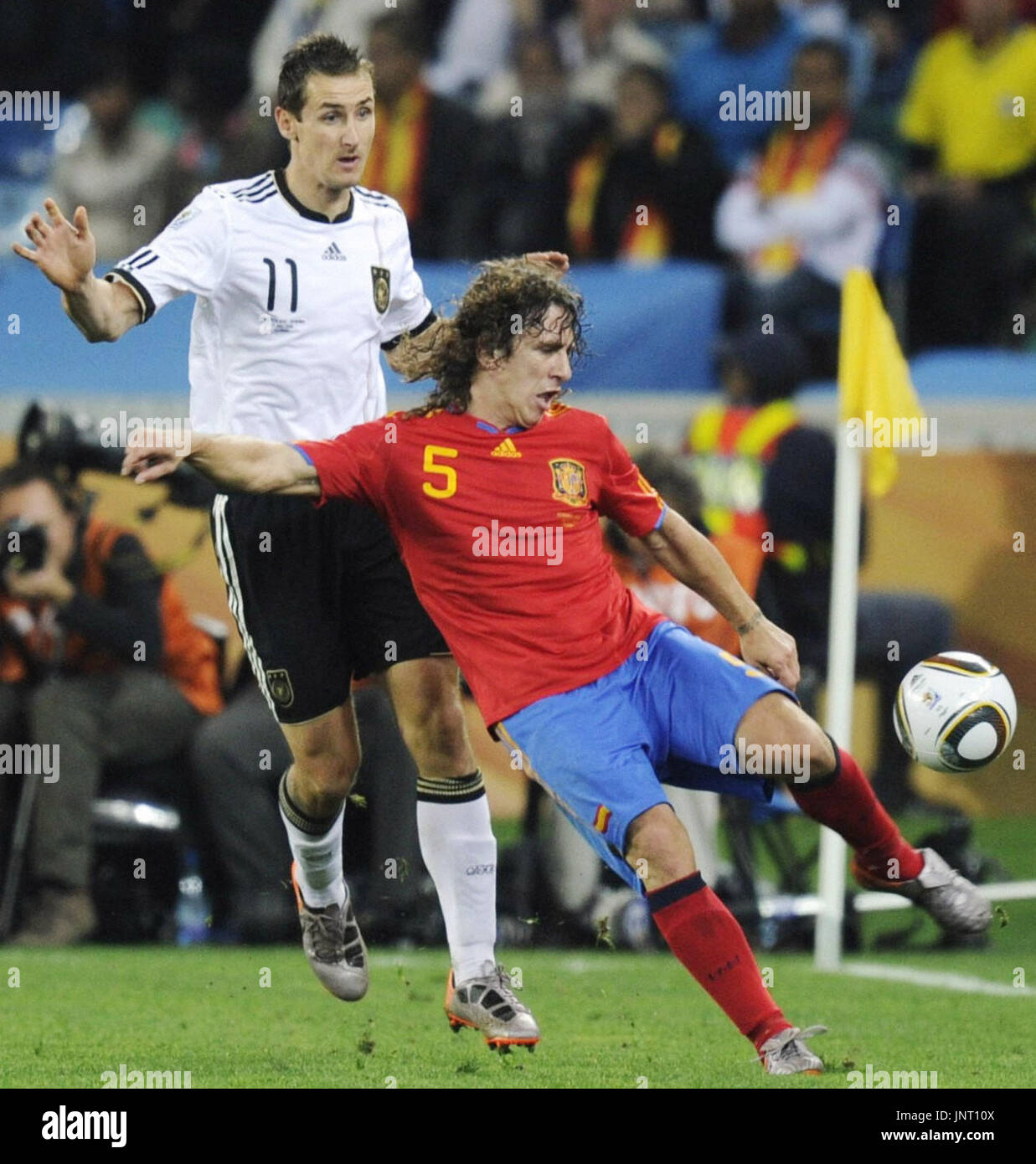 DURBAN, South Africa - Spain defender Carles Puyol (5) clears the ball ...
