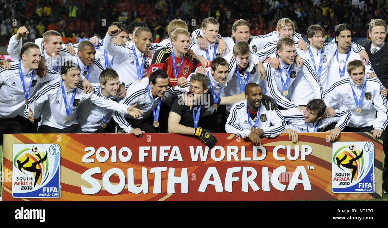 PORT ELIZABETH, South Africa - Germany players pose for photos after ...