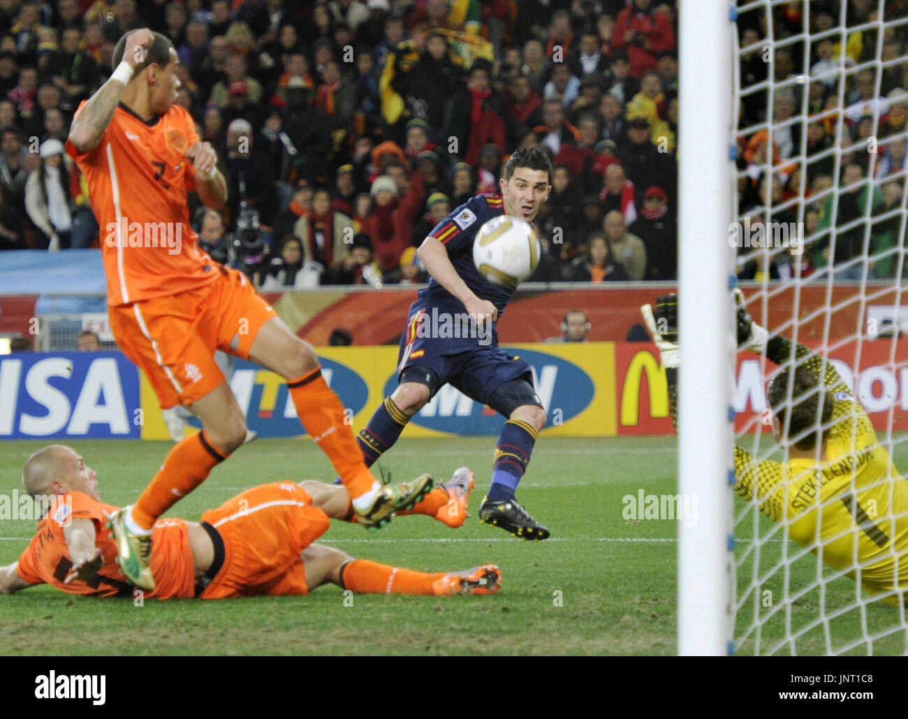 JOHANNESBURG, South Africa - Spain striker David Villa (R, back) shoots ...