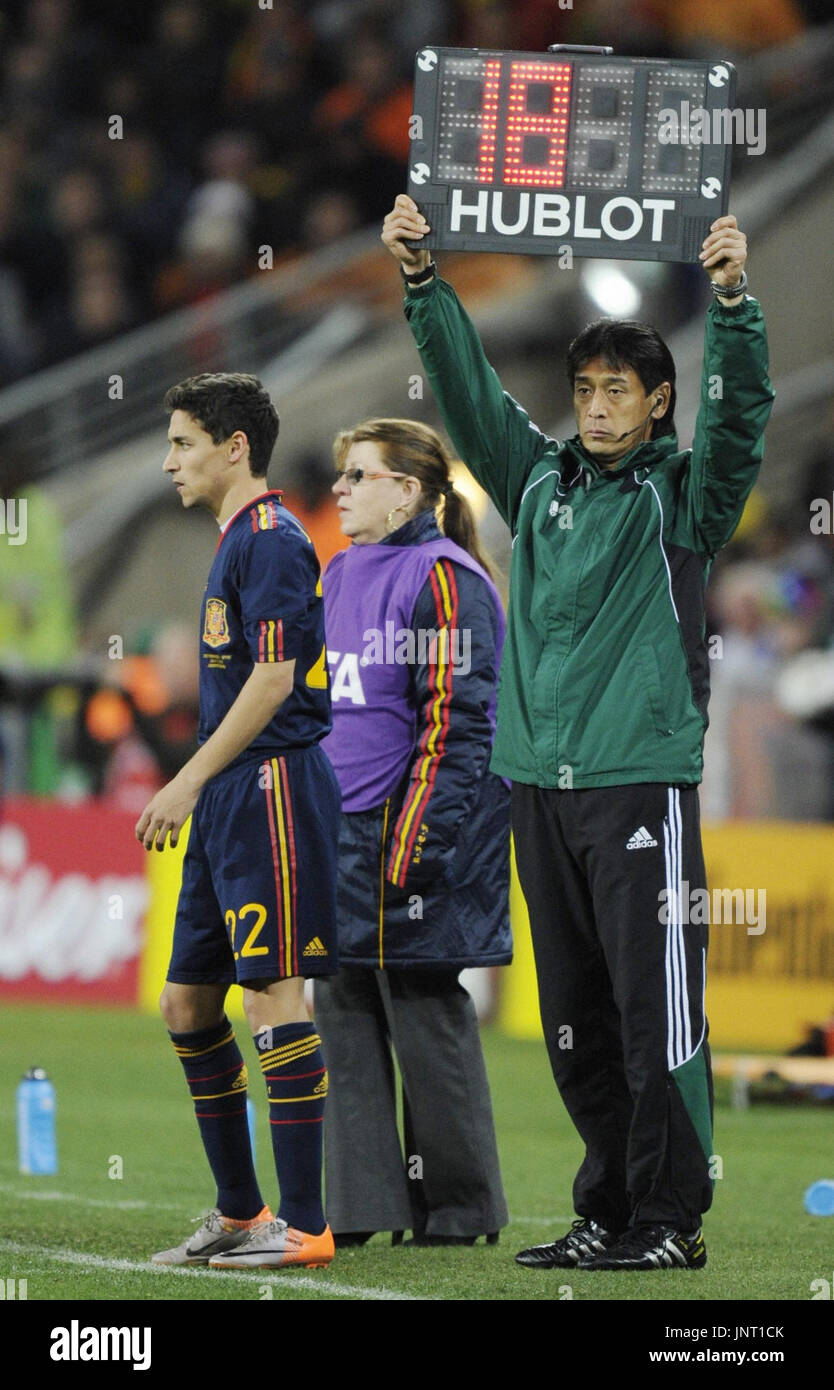 JOHANNESBURG, South Africa - Japanese referee Yuichi Nishimura holds up ...