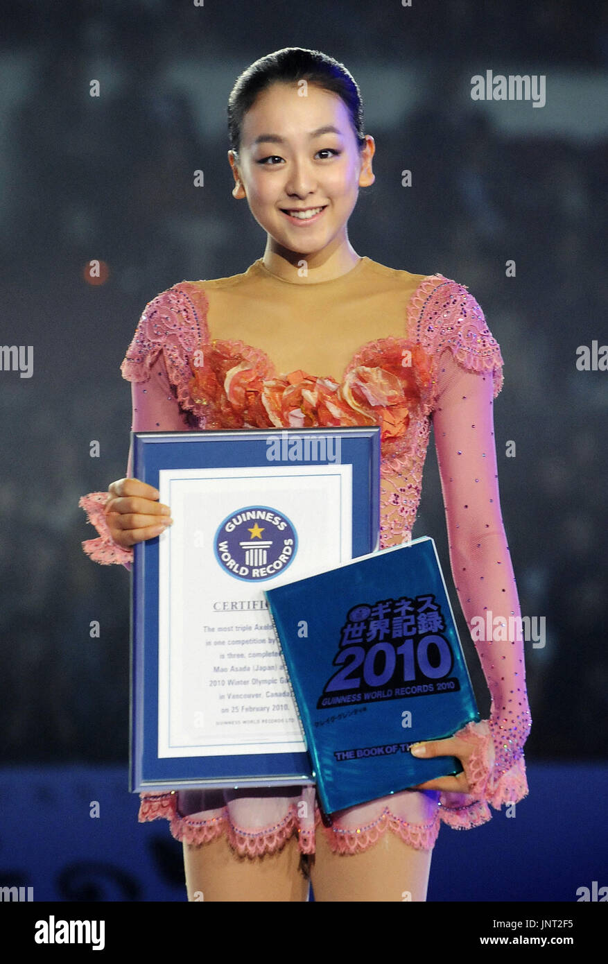 TOKYO, Japan - Newly crowned world champion Mao Asada shows a ...