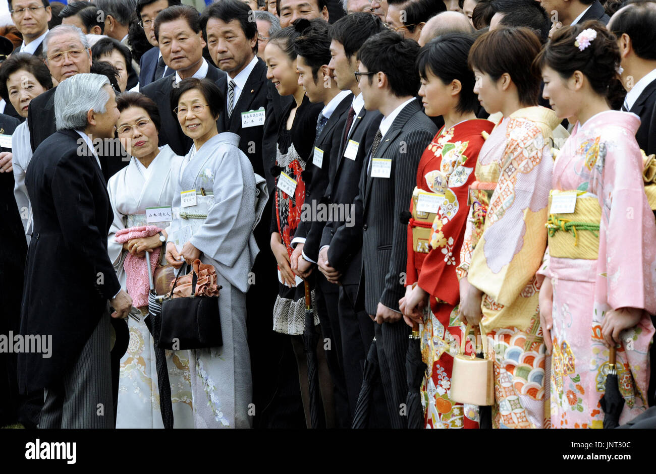 TOKYO, Japan - Japanese Emperor Akihito (L) talks to Vancouver Olympic ...