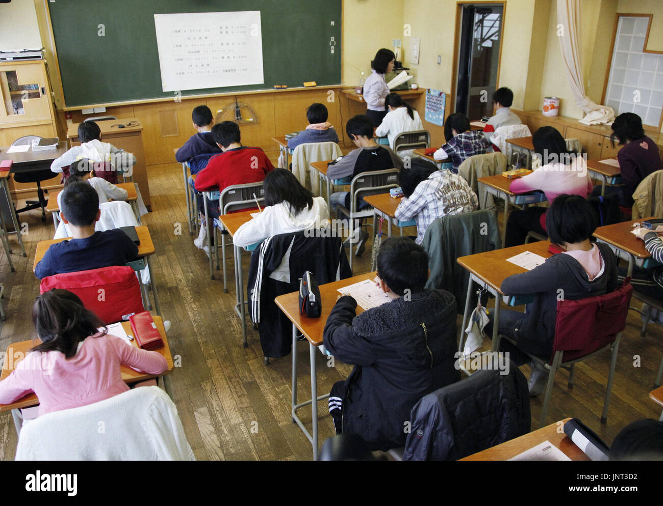 TOKYO, Japan - School children sit to take annual national achievement ...