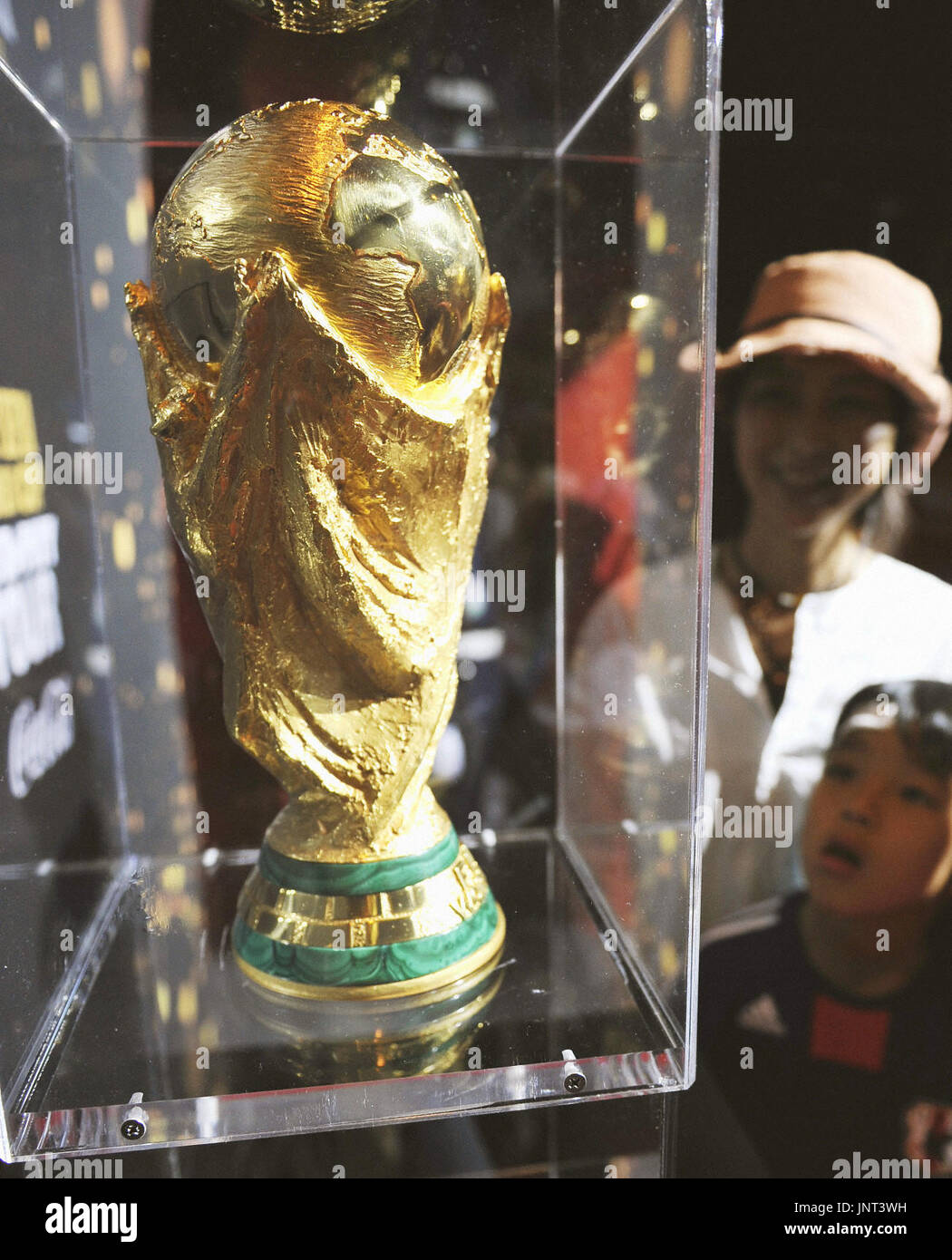 TOKYO, Japan - The FIFA World Cup trophy goes on display to the public ...
