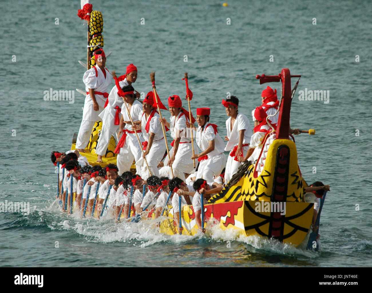 NAHA, Japan - A dragon boat races in the ''hari'' competition in Naha ...