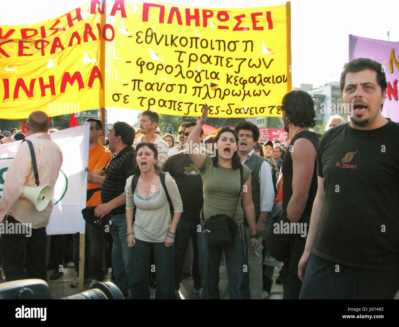 ATHENS, Greece - Labor union members stage a rally near the parliament ...