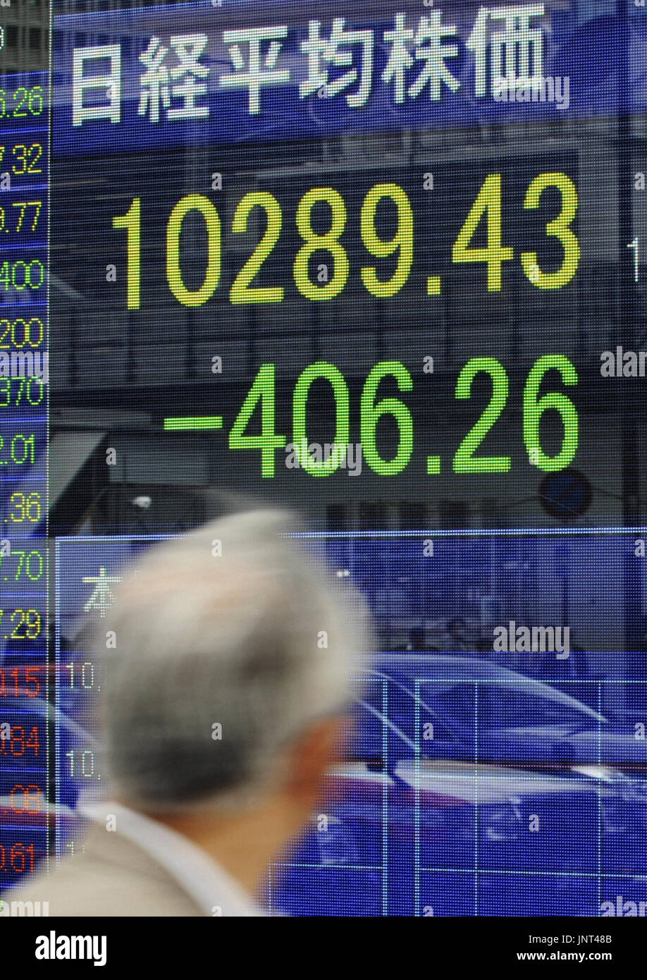 TOKYO, Japan - An electronic board in Tokyo's Yaesu district shows the ...