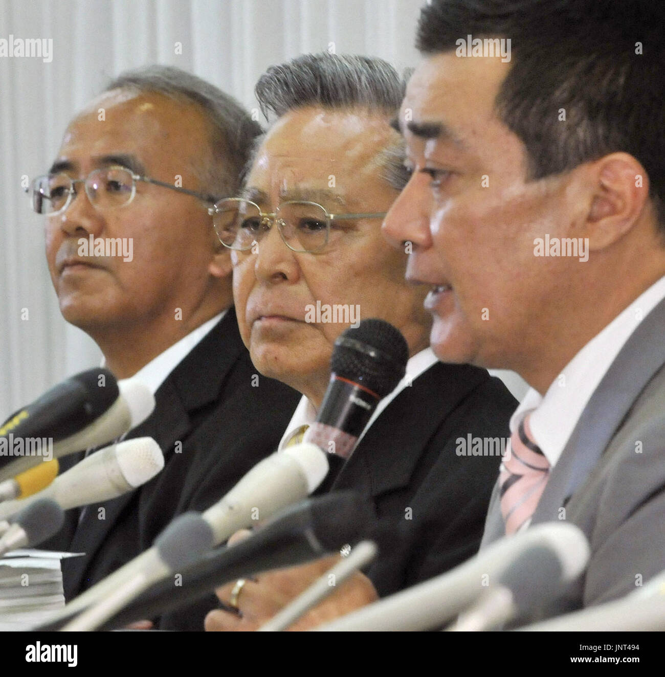TOKYO, Japan - (From L to R) Isen Mayor Akira Okubo, Amagi Mayor Kosuke ...