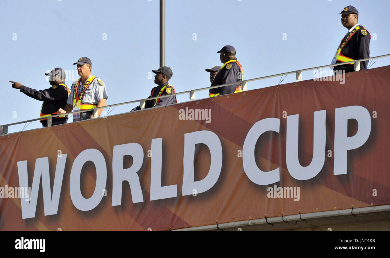 DURBAN, South Africa - Police officers stand guard near Moses Mabhida ...