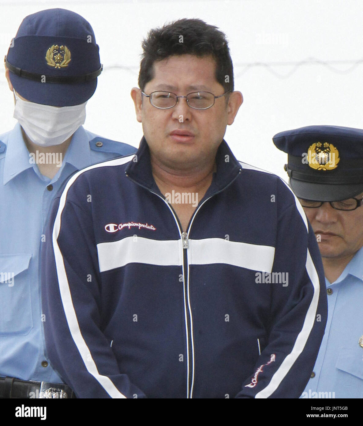 HIROSHIMA, Japan - Toshiaki Hikiji leaves a police station in the town ...