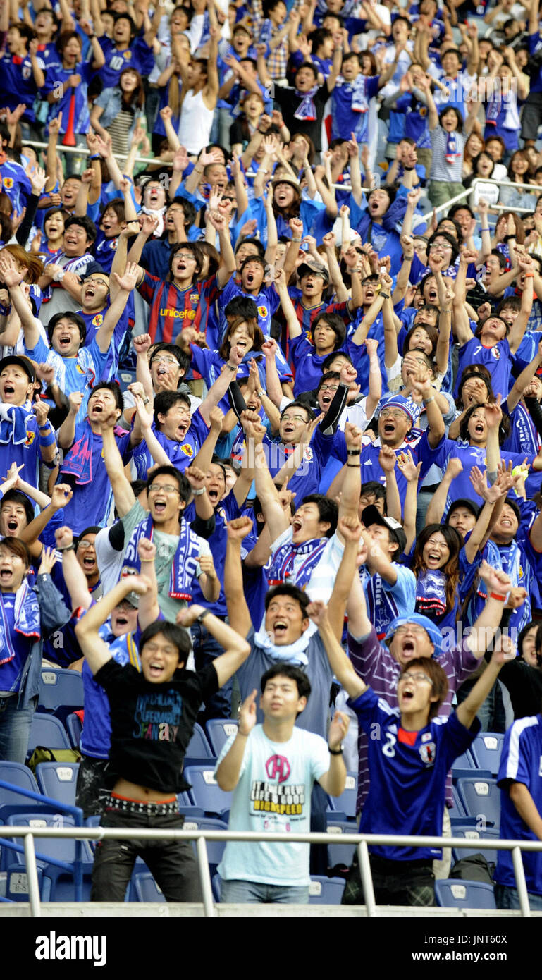 SAITAMA, Japan - Supporters of Japan's soccer team celebrate after ...
