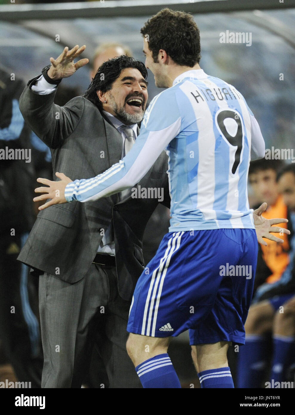 JOHANNESBURG, South Africa - Argentina coach Diego Maradona (L) hugs striker Gonzalo Higuain ...