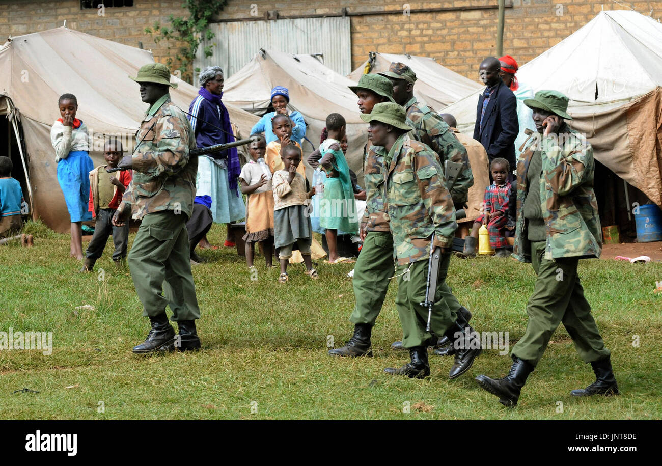 NAIROBI, Kenya - Kenyan security force troops patrol around a refugee ...