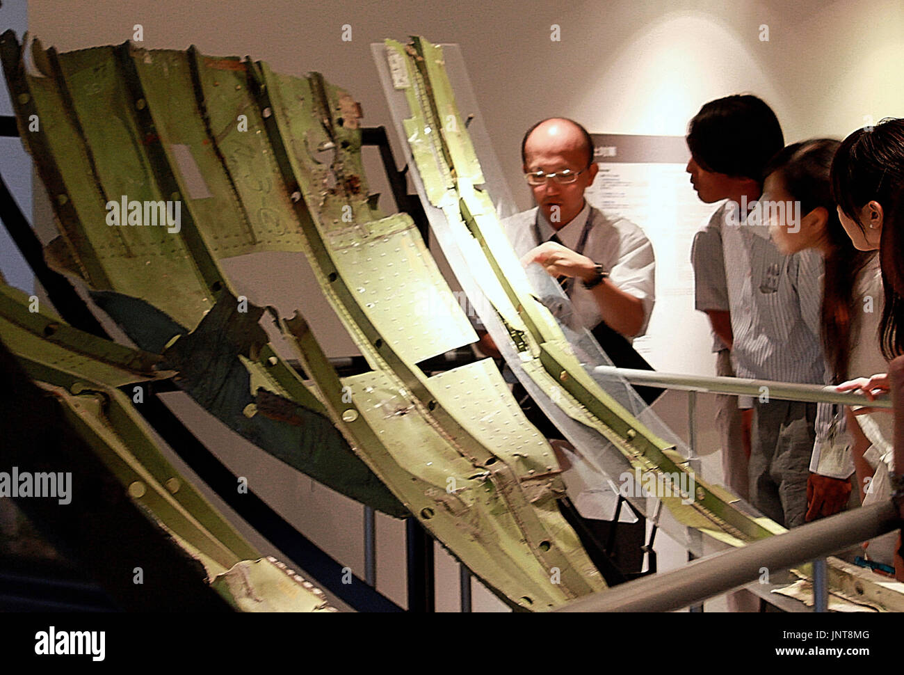 TOKYO, Japan - A Japan Airlines instructor shows to JAL employees the ...