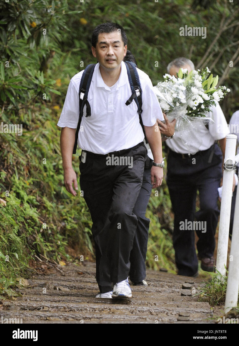 UENO, Japan - Japan Airlines President Masaru Onishi hikes up to the ...