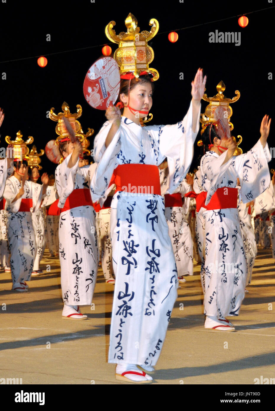 KUMAMOTO, Japan - Women wearing lantern headpieces like crowns dance ...