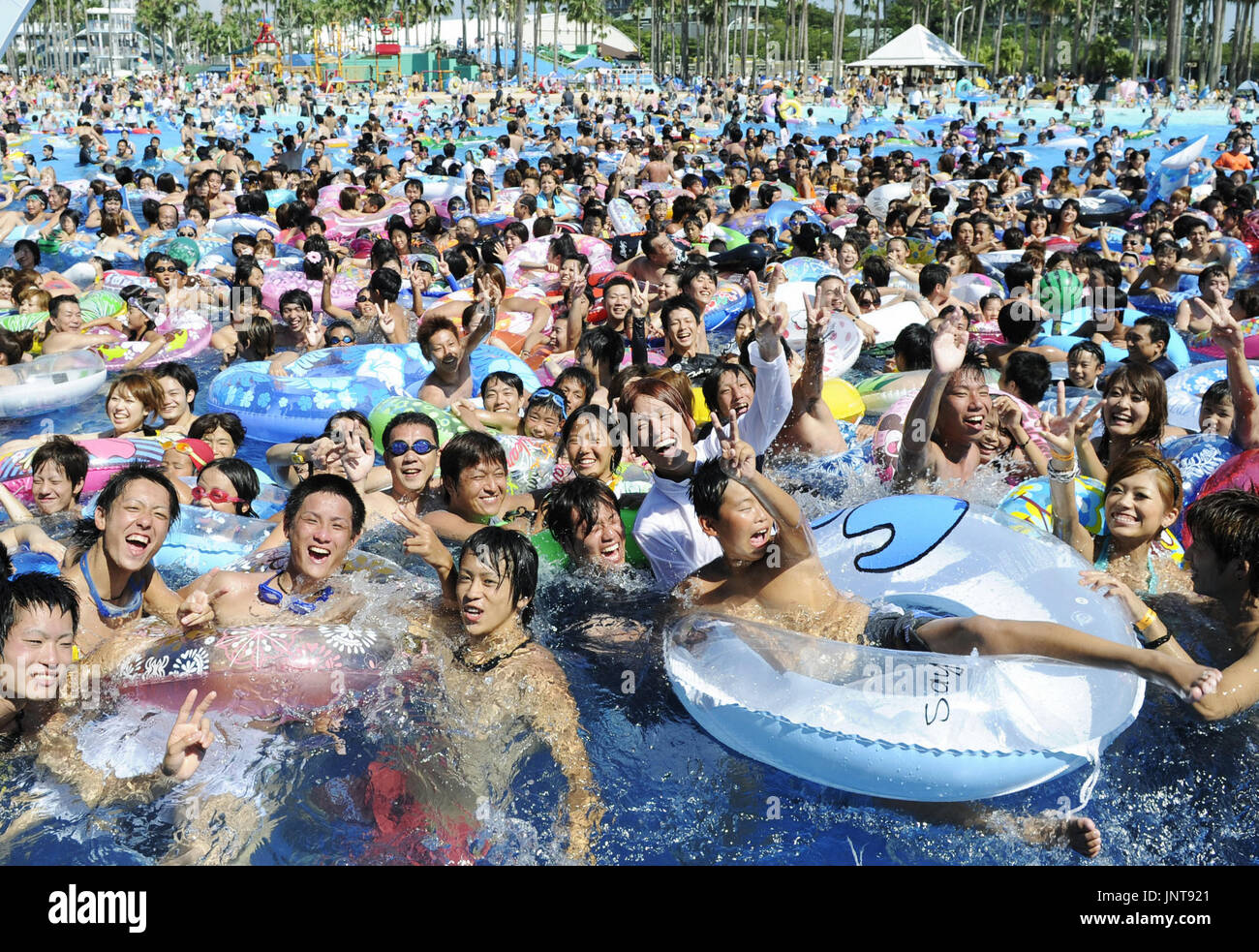 KUWANA, Japan - People pack a swimming pool at Nagashima Spaland ...