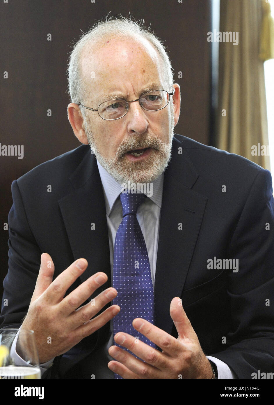TOKYO, Japan - Central Bank of Ireland Governor Patrick Honohan speaks in an interview with ...