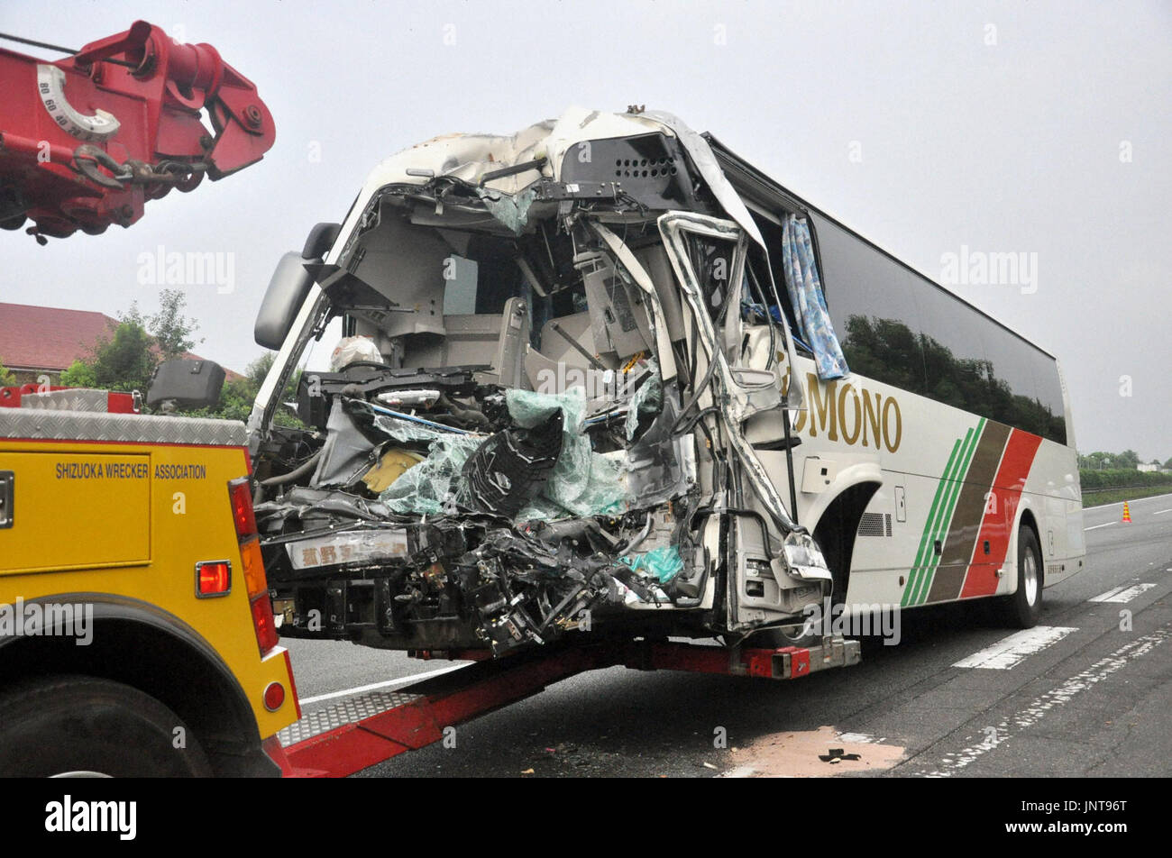 SHIZUOKA, Japan - A crashed bus shows damage after hitting a trailer ...