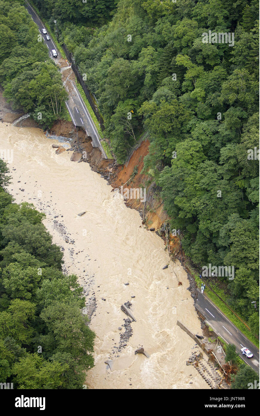 SAPPORO, Japan - Photo shows a collapsed road near the Chubetsu River ...