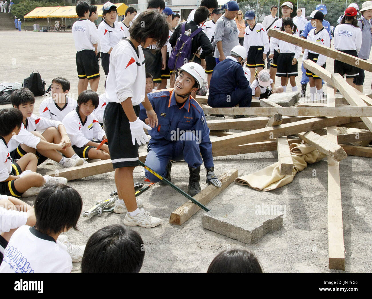 ITO, Japan - Firefighting volunteers explain to junior high school ...