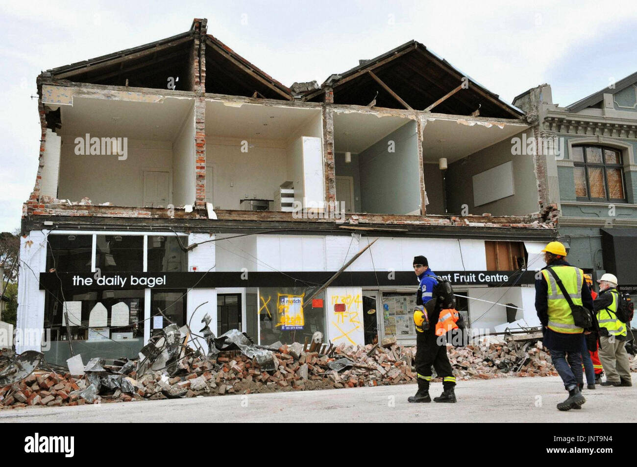 CHRISTCHURCH, New Zealand - The front of a building lies collapsed in ...