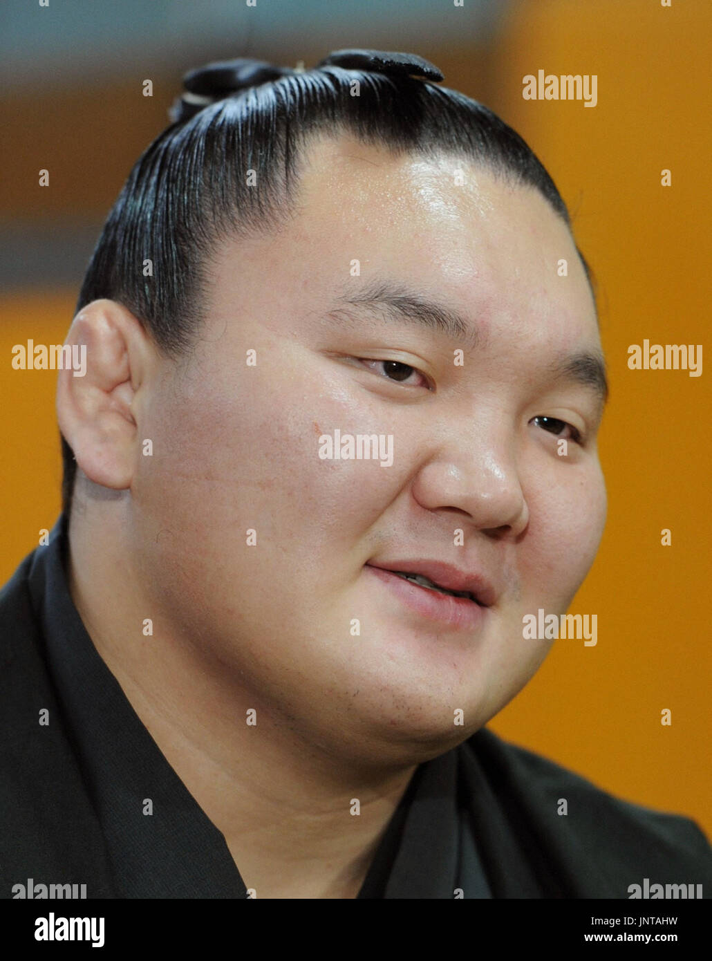 TOKYO, Japan - Mongolian grand champion Hakuho meets the press at his ...