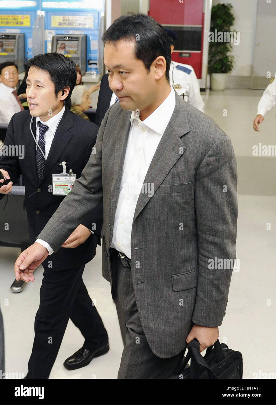 SHANGHAI, China - Fujita Corp. employee Hiroki Hashimoto arrives at Haneda airport in Tokyo from ...