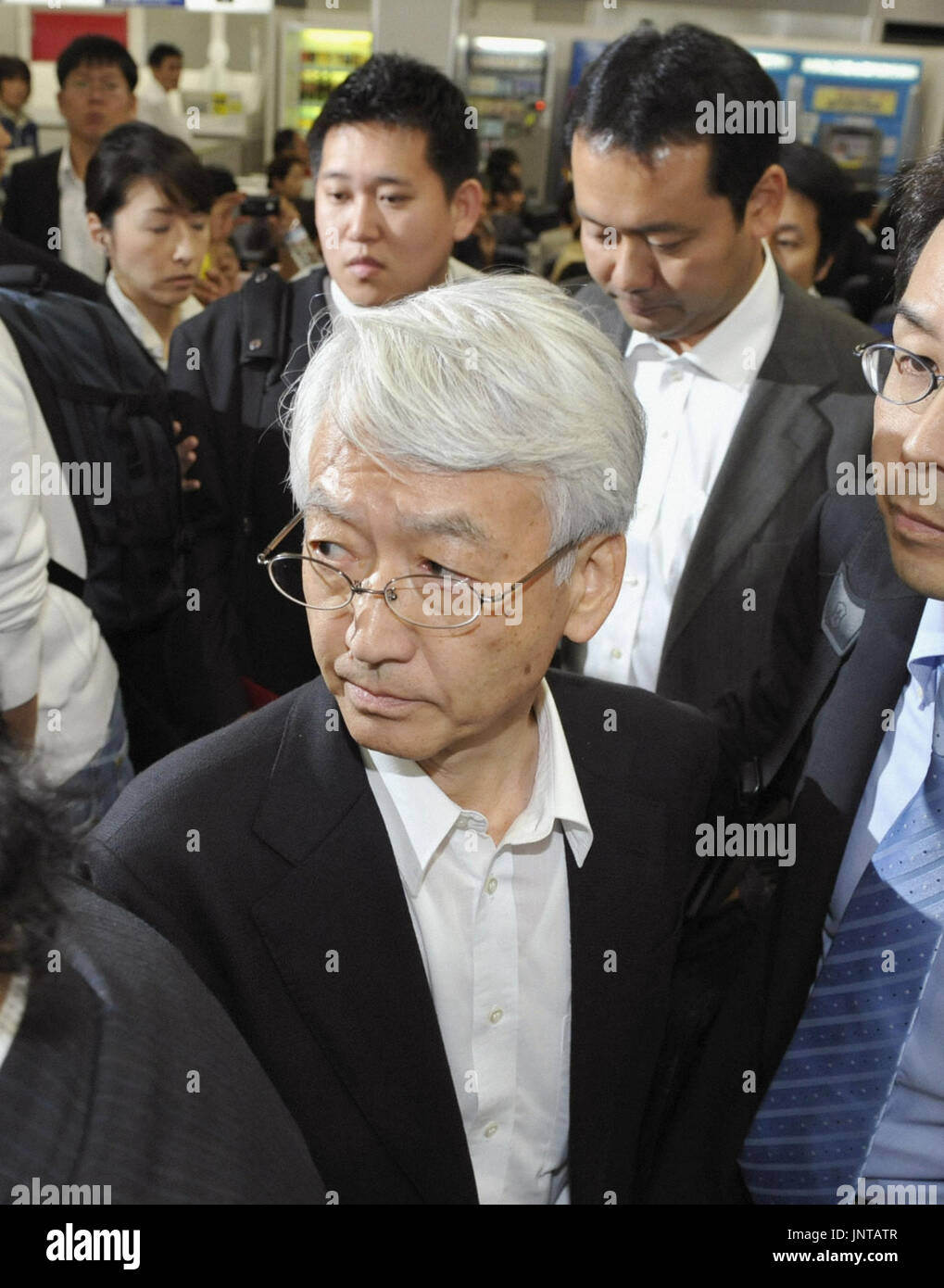 SHANGHAI, China - Fujita Corp. employee Junichi Iguchi (C) arrives at ...